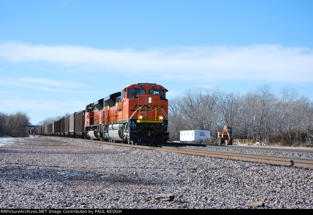 BNSF 9034 pulls eastward towards the BNSF Lincoln Nebraska yard as the Lead Unit on a Loaded ...